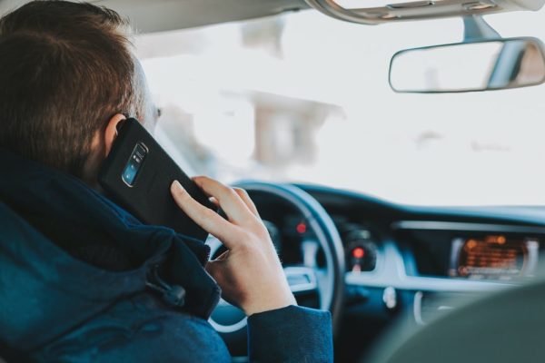 Using Mobile Phones While Driving in Dubai: Rules, Fines, and Safety ...